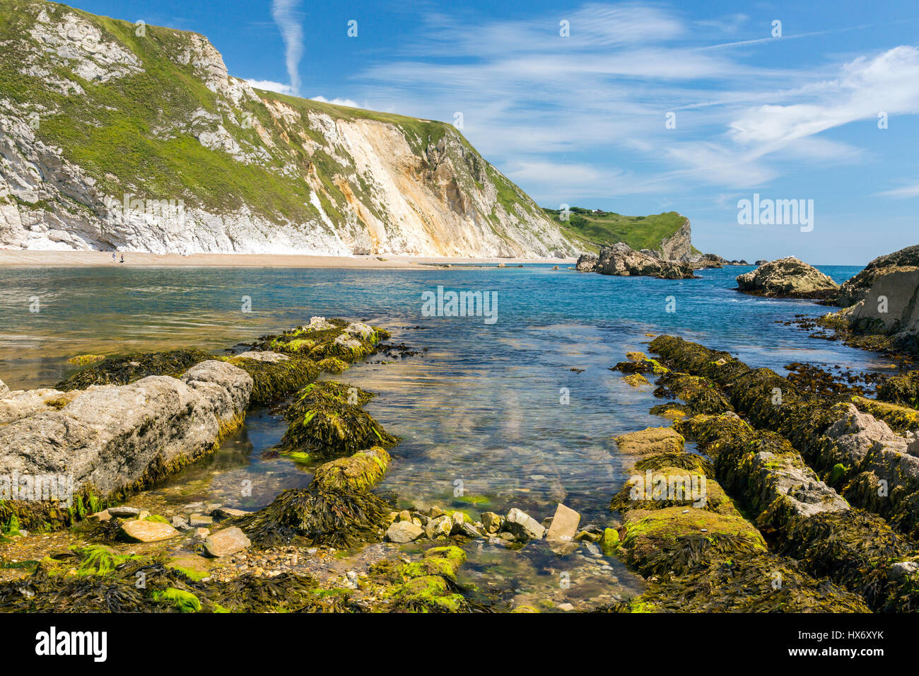 Looking into rock pools below the chalk cliffs of Man O'War Bay from ...
