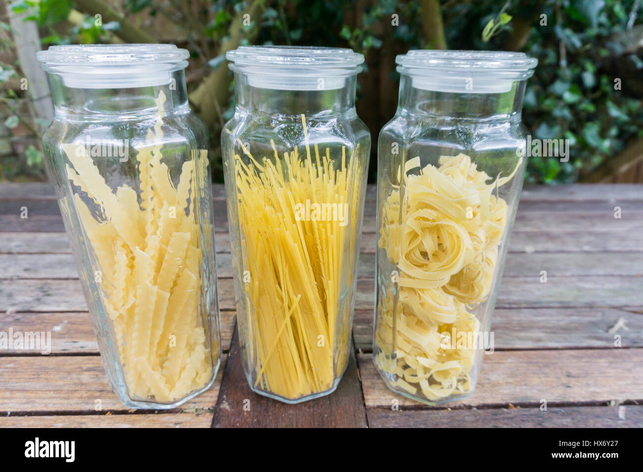 Pasta in display jars Stock Photo - Alamy