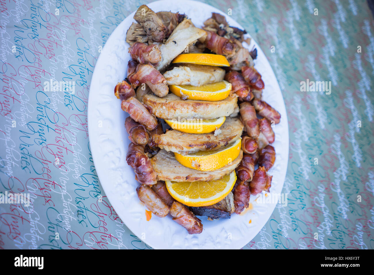 Pork roast on a display plate Stock Photo - Alamy