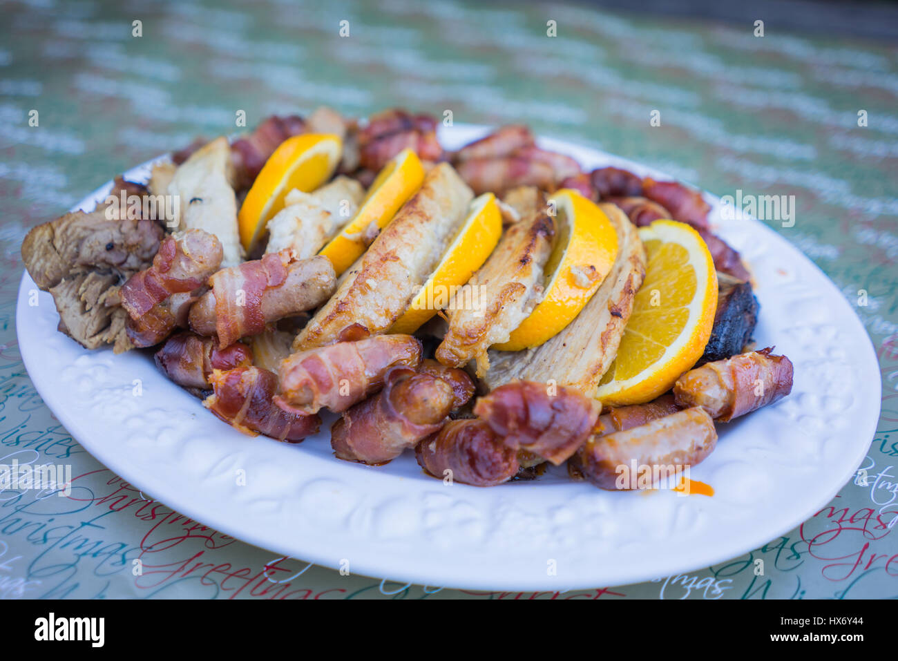 Pork roast on a display plate Stock Photo - Alamy