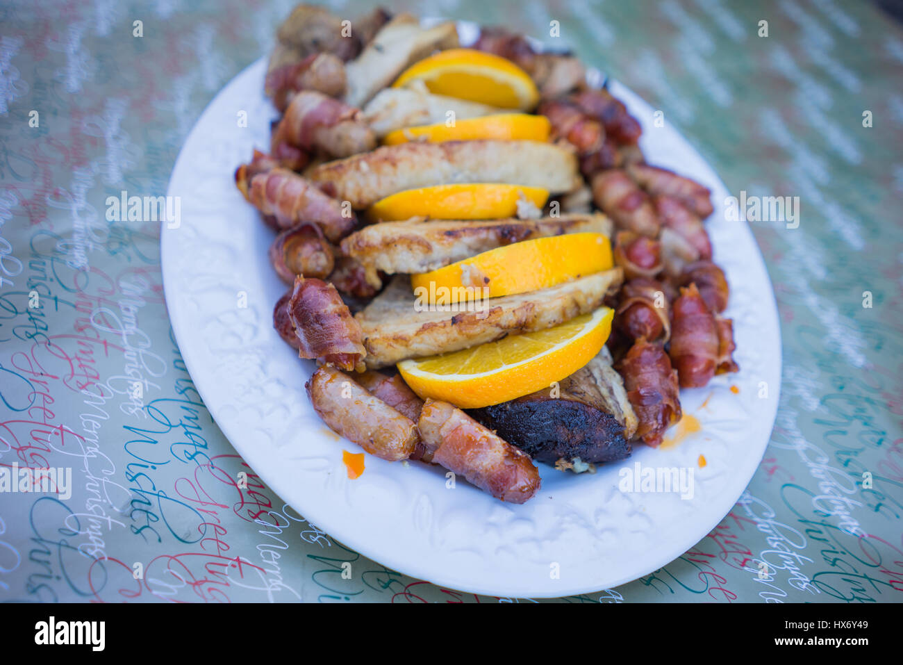 Pork roast on a display plate Stock Photo - Alamy
