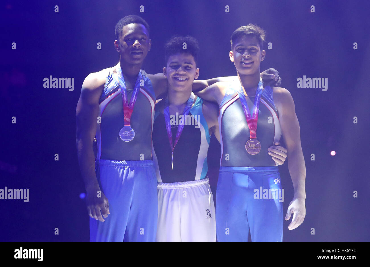 All Round under 18's gold medalist Jamie Lewis (centre) with Silver ...