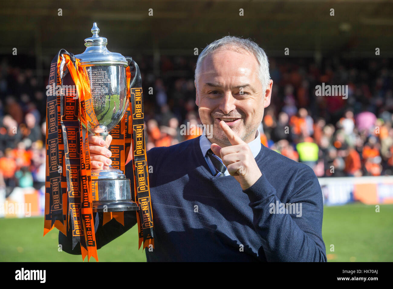 Dundee United manager Ray McKinnon celebrates with the trophy after ...