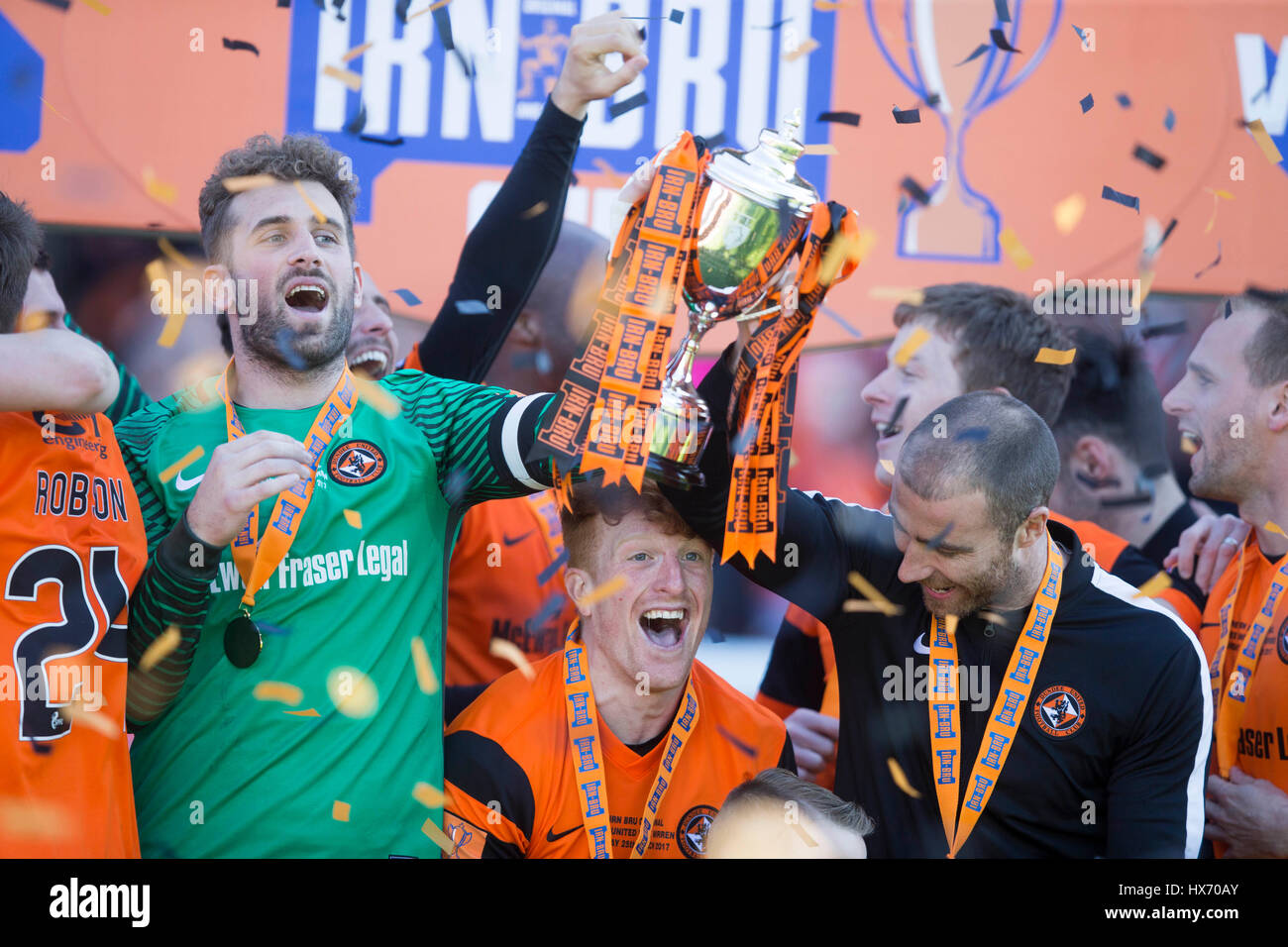 Dundee United's Simon Murray (centre) and Cammy Bell (left) celebrate ...