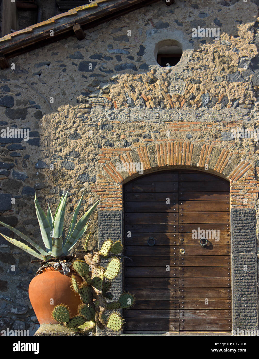 A typical and traditional italian door in a small village Stock Photo ...