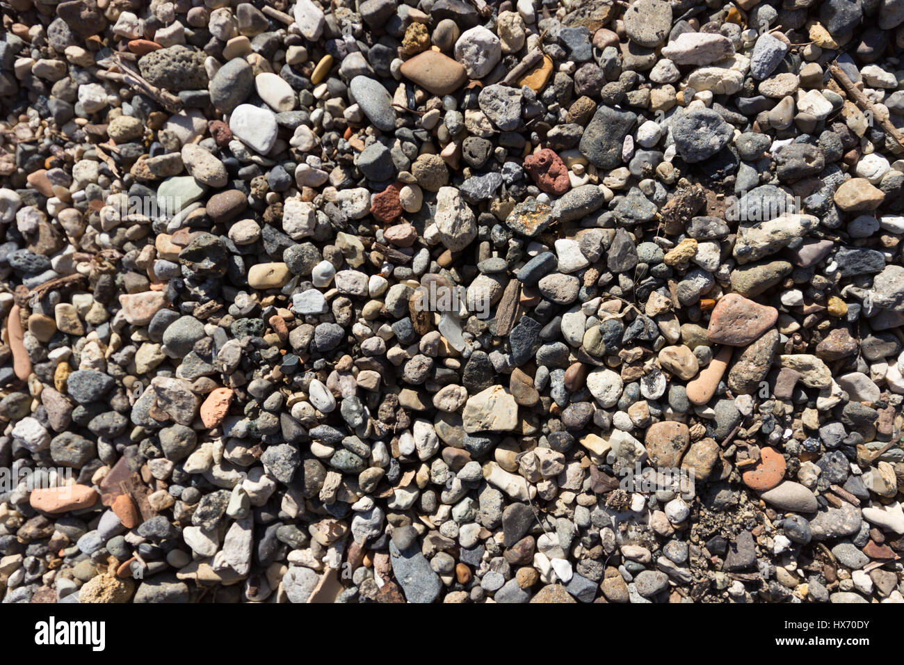 Little pebbles on a beach texture Stock Photo - Alamy