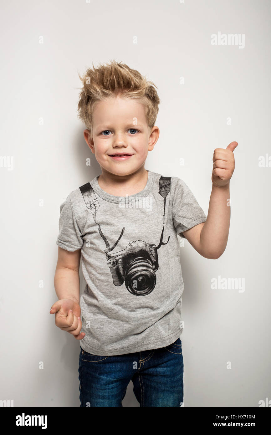 Portrait of happy joyful beautiful little boy. Studio portrait over ...