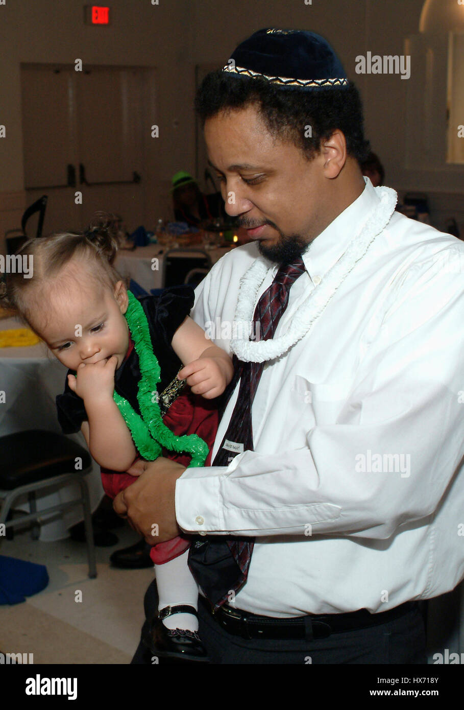 A Jewish African American with his baby child Stock Photo - Alamy