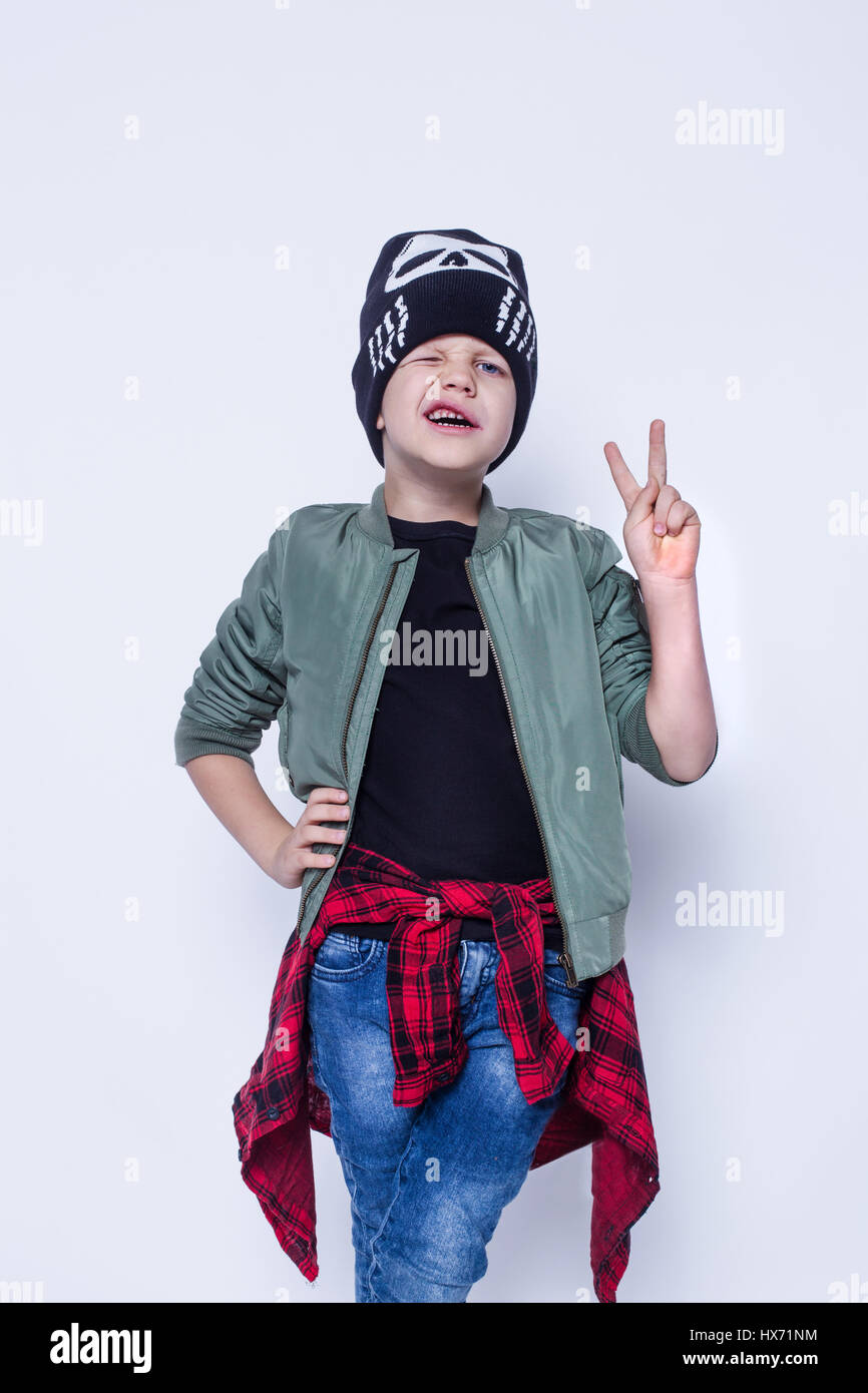 Fashionable little bad boy. Studio portrait isolated over white ...
