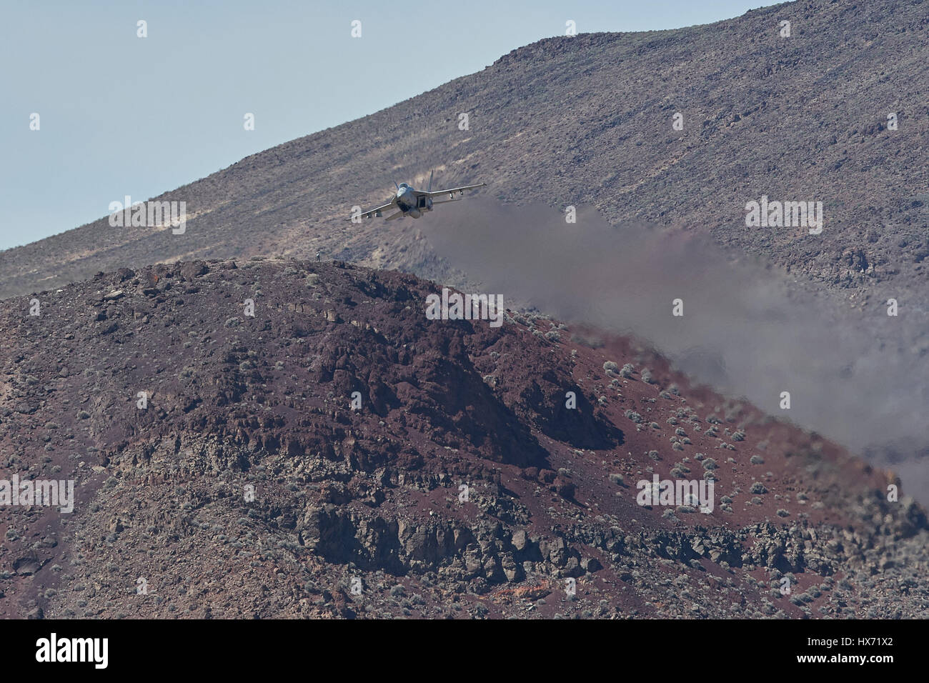United States Navy F/A-18F Super Hornet Flying At Low Level Through A ...