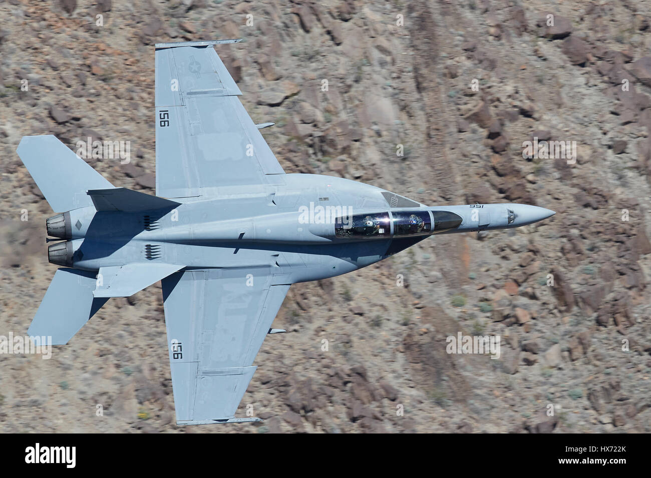 United States Navy F/A-18F Super Hornet Flying At Low Level Through A ...