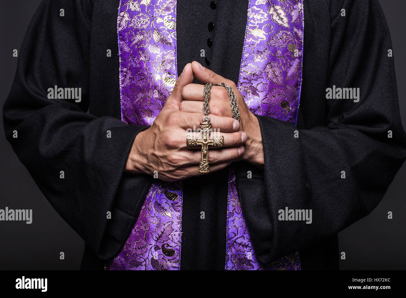 Concept: prayer. Studio shot on black background Stock Photo - Alamy
