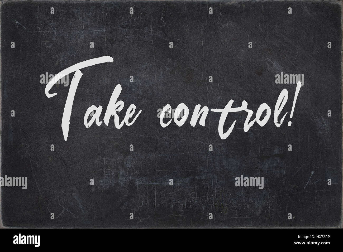 motivational message on black chalkboard Stock Photo - Alamy