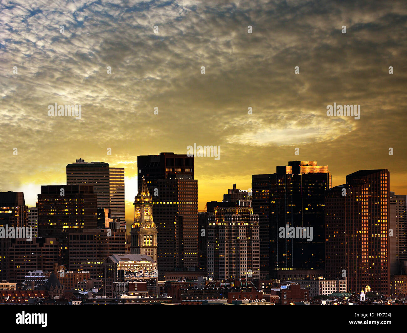 An unusual clouds formation over Boston cityscape, mass, at the sunset ...