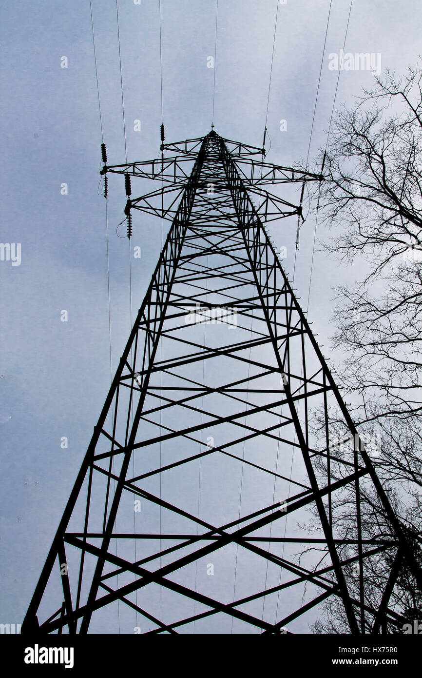 High pole mains. Electricity. High voltage network Stock Photo - Alamy