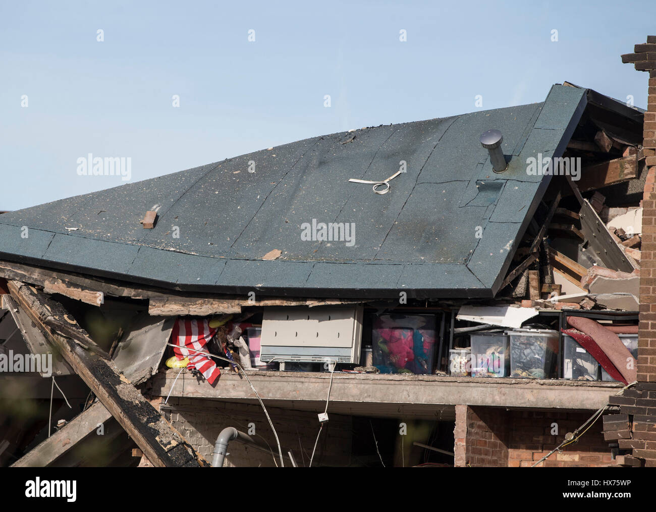A collapsed roof at the scene of a suspected gas explosion in Bebington ...