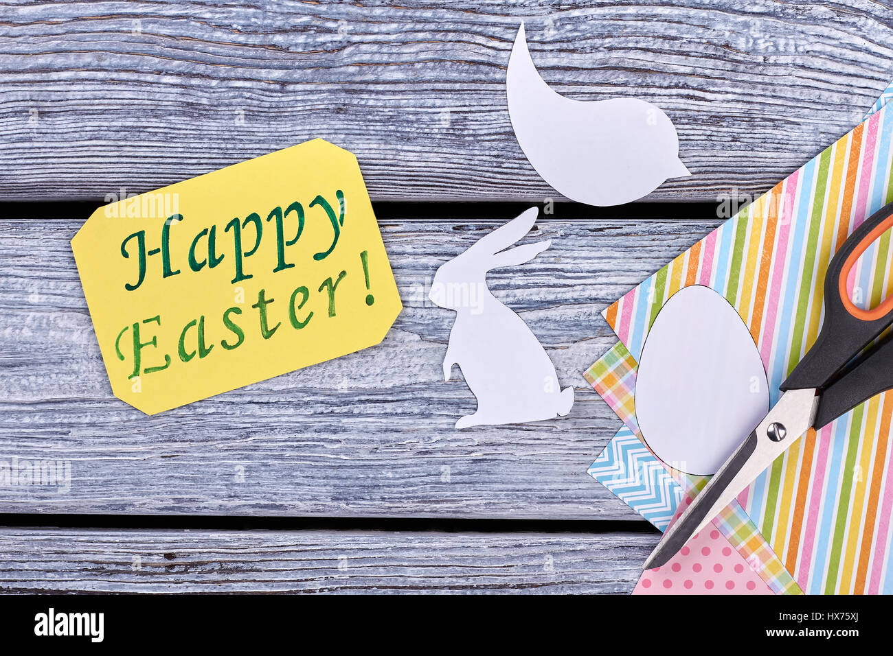 Papercut figures and a greeting card Stock Photo - Alamy