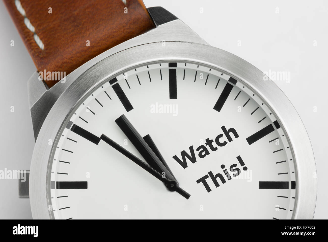 Analog watch with conceptual visualization of the text Watch This Stock ...