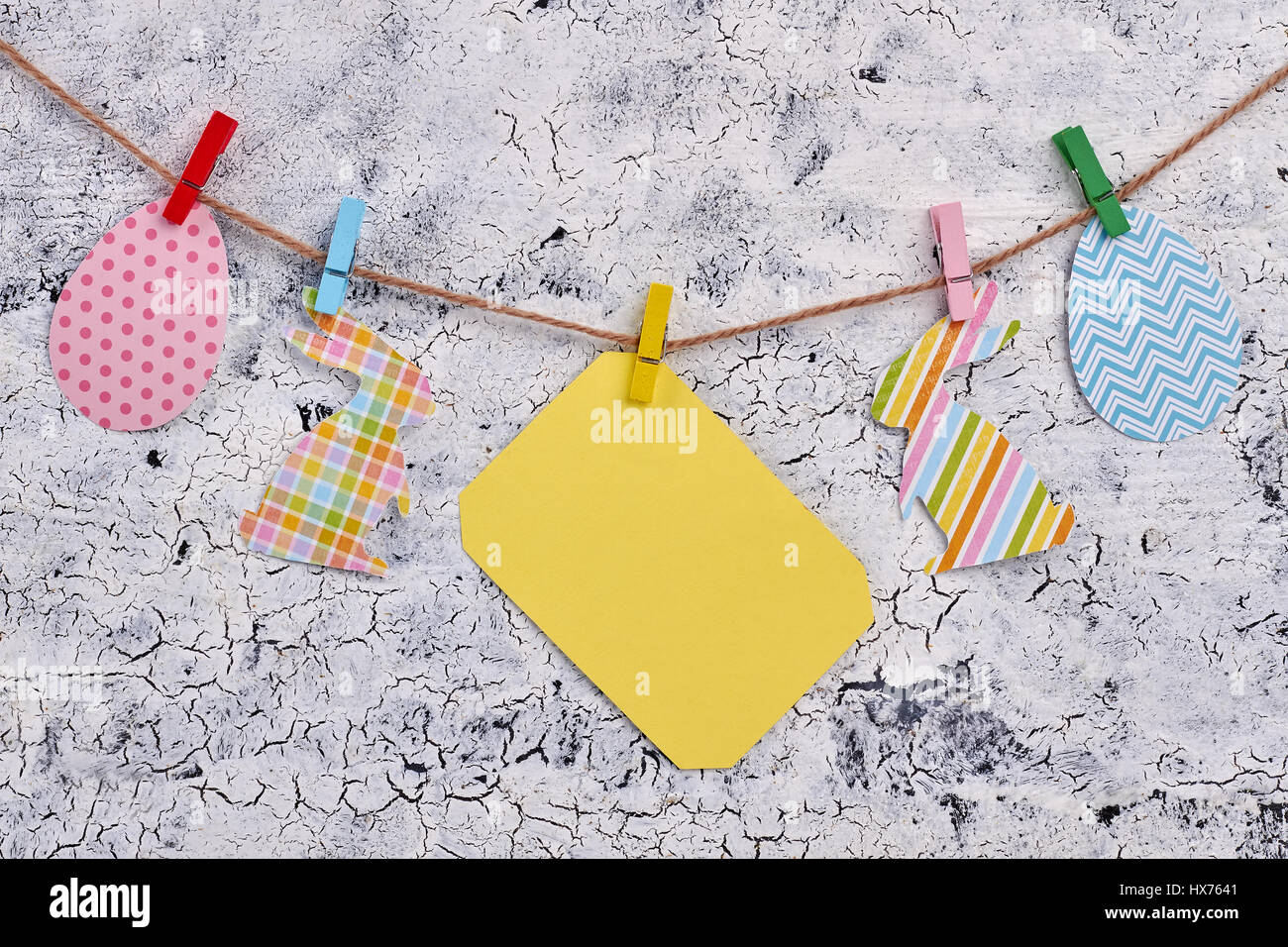 Easter paper cutouts and clothespins Stock Photo - Alamy