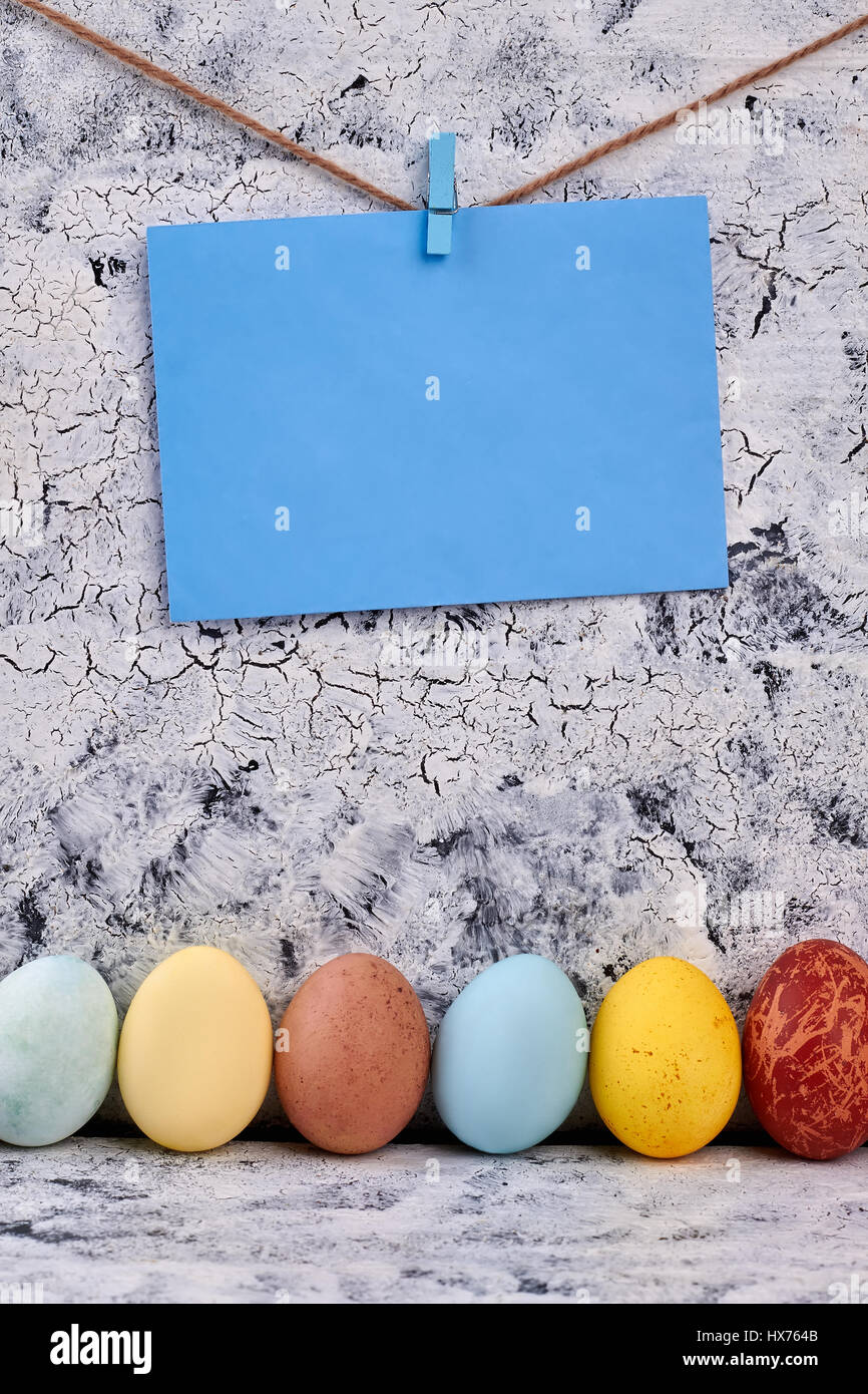 Easter eggs, blank blue card Stock Photo - Alamy