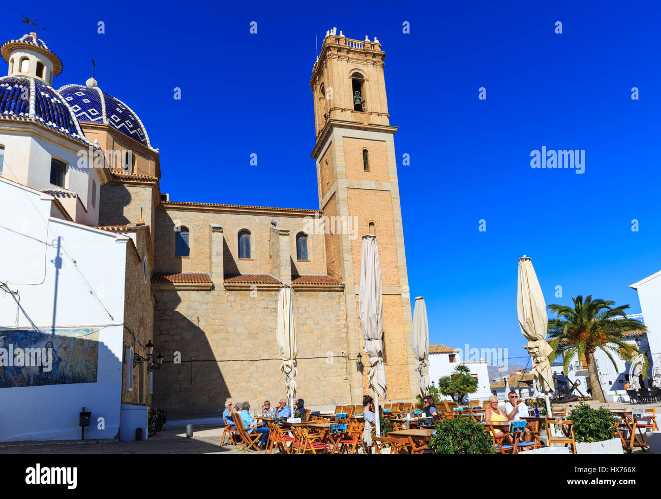 The Church of the Virgin del Consuelo and main square cafes, Altea Old ...
