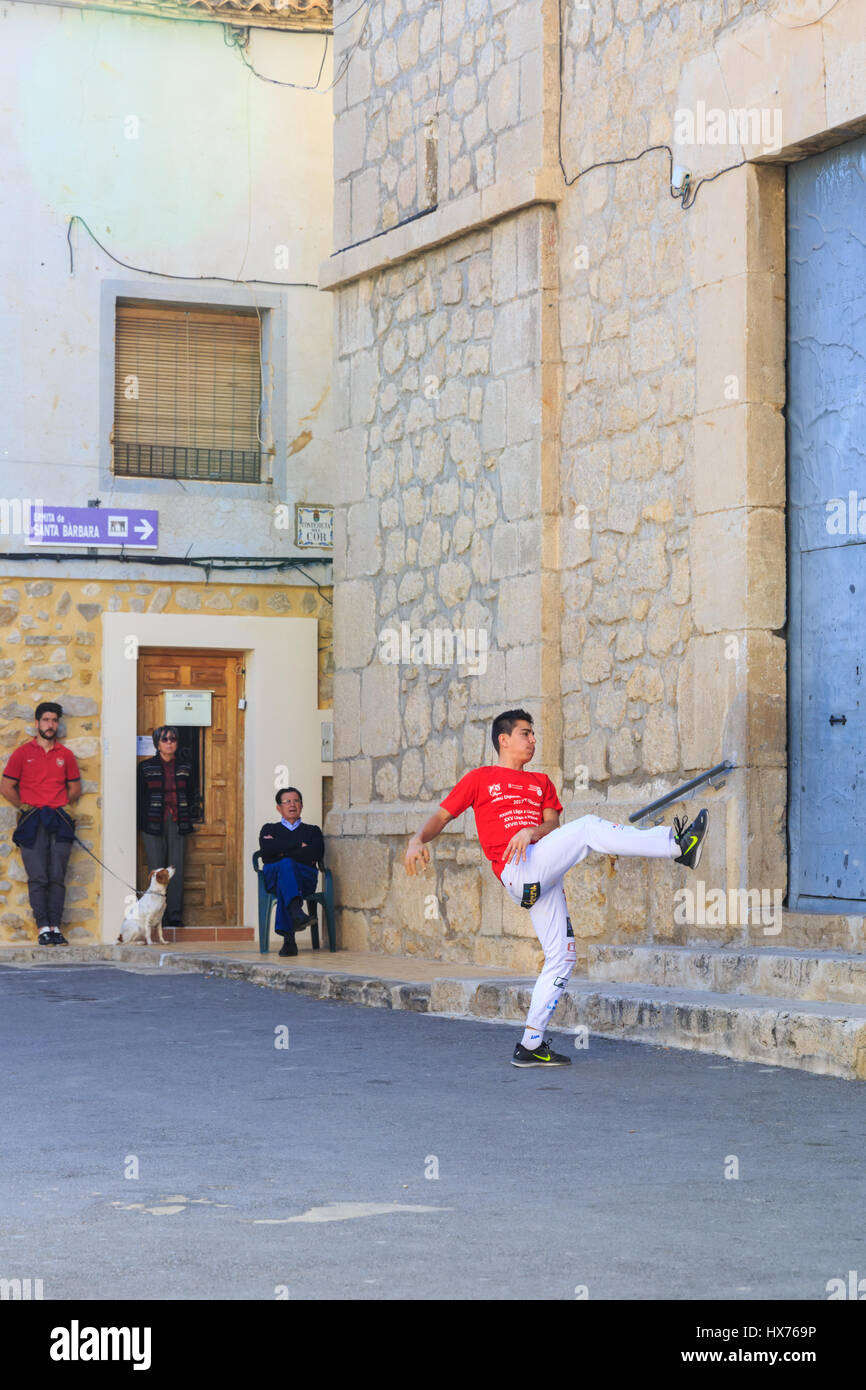 A player participates in the traditional game of Pilota Valenciana, in ...