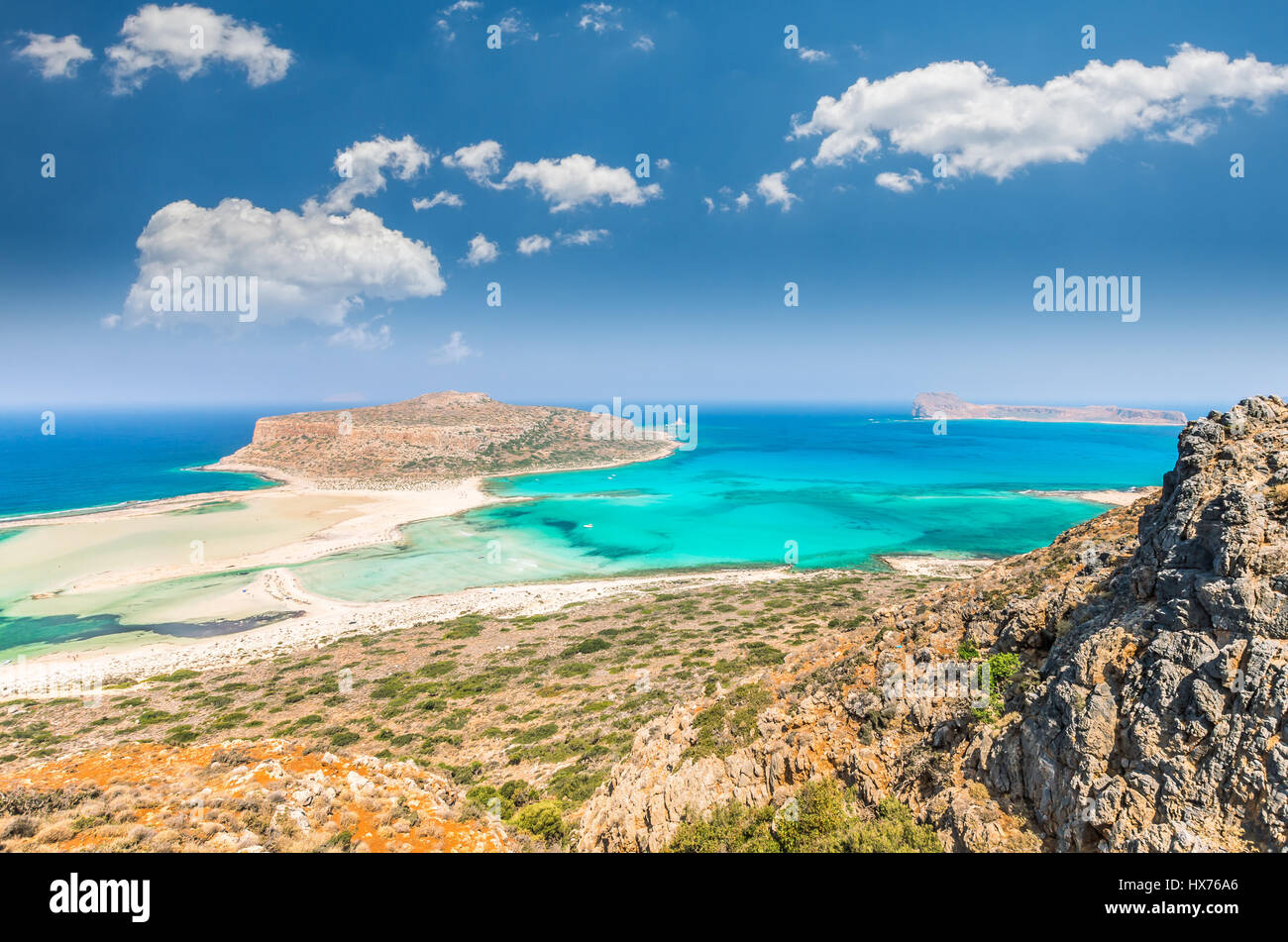 Balos lagoon on Crete island, Greece. Tourists relax and bath in ...