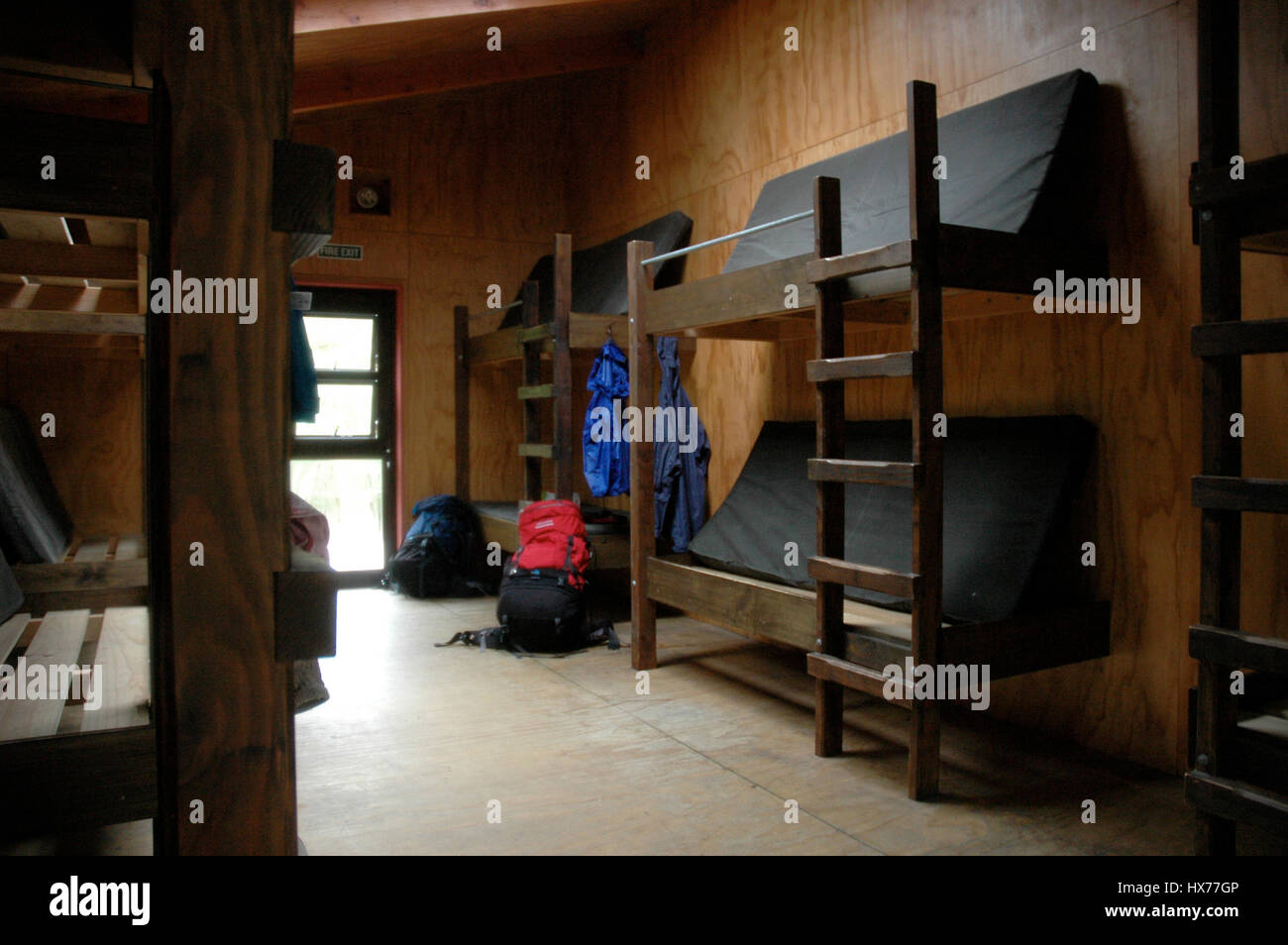 Bunk beds in one of the camp houses along the Milford Track Stock Photo ...