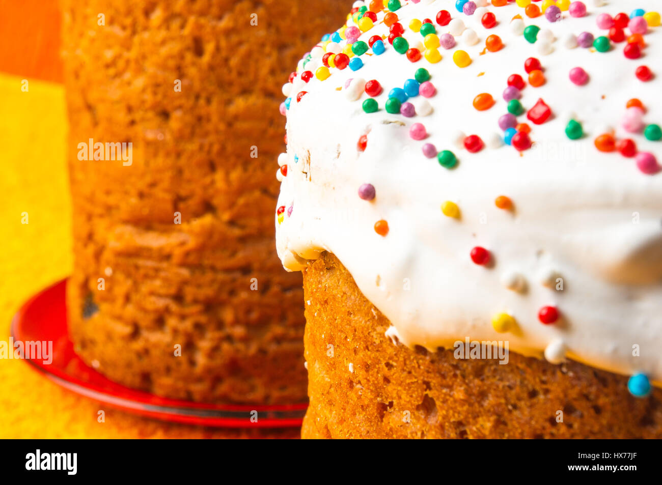 Kulichi, traditional Russian Easter cake with icing and dyed eggs Stock ...