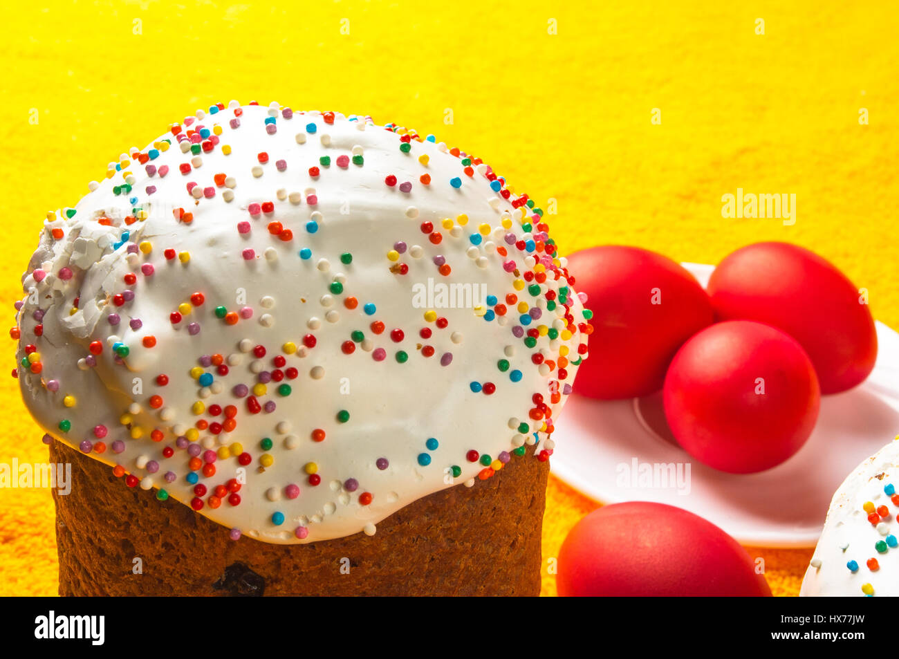 Kulichi, traditional Russian Easter cake with icing and dyed eggs Stock ...