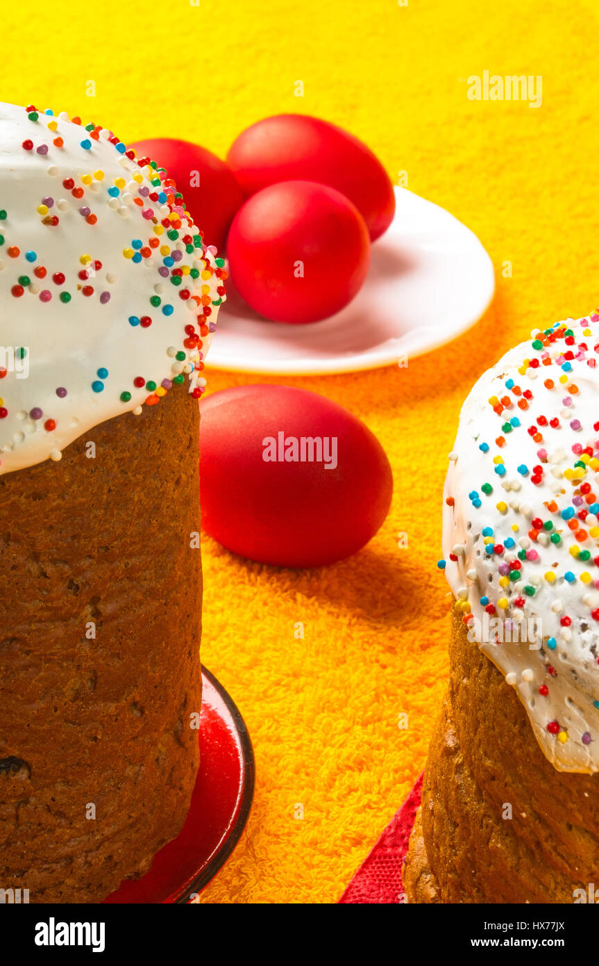 Kulichi, traditional Russian Easter cake with icing and dyed eggs Stock ...