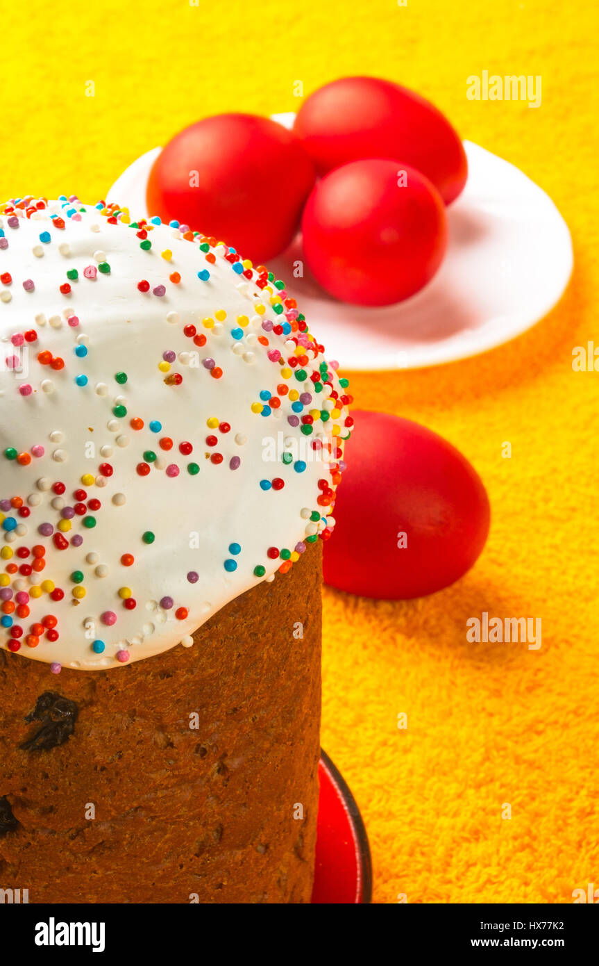 Kulichi, traditional Russian Easter cake with icing and dyed eggs Stock ...