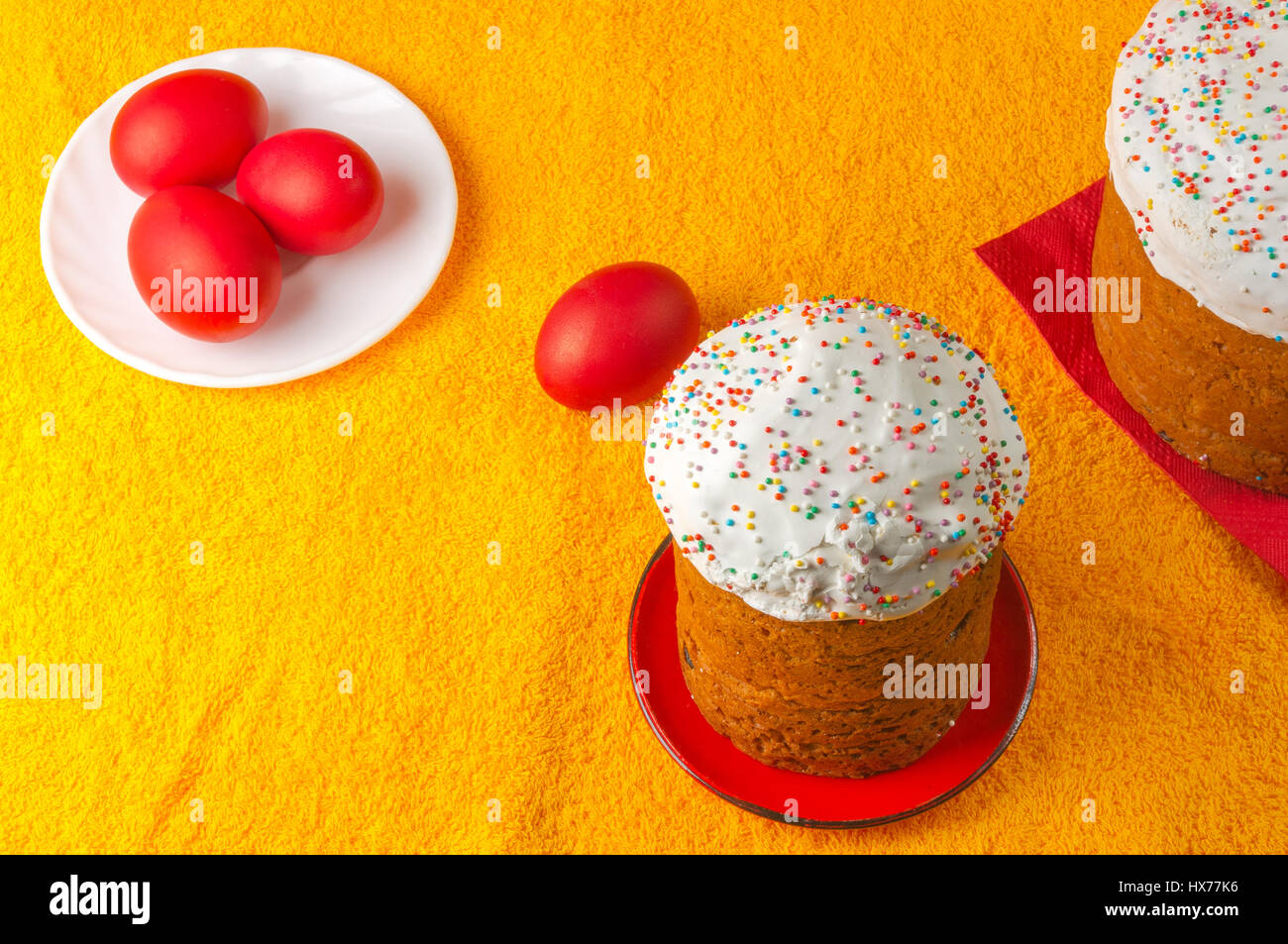 Kulichi, traditional Russian Easter cake with icing and dyed eggs Stock ...
