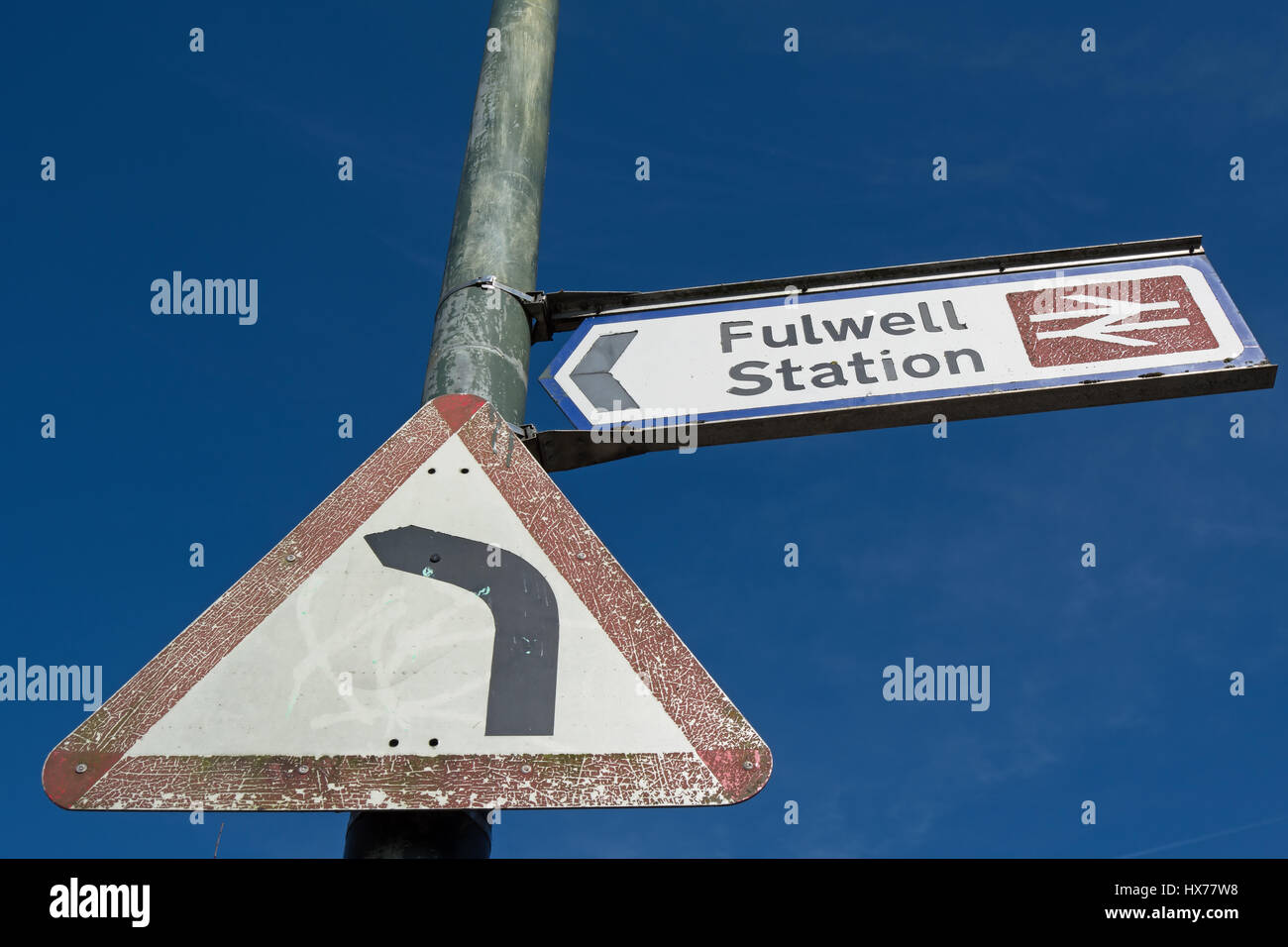 sign for fulwell station, southwest london, with road sign indicating a ...