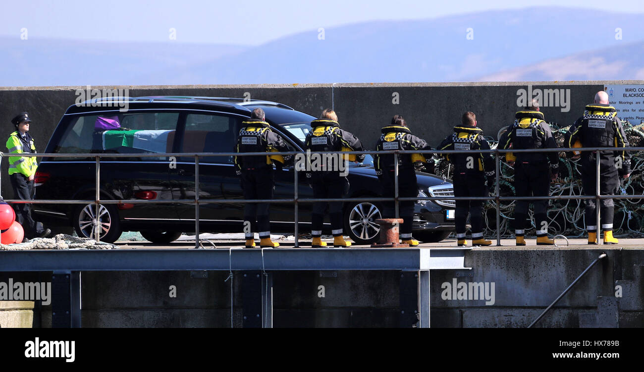 The body of Captain Mark Duffy is driven in a hearse along the seafront ...