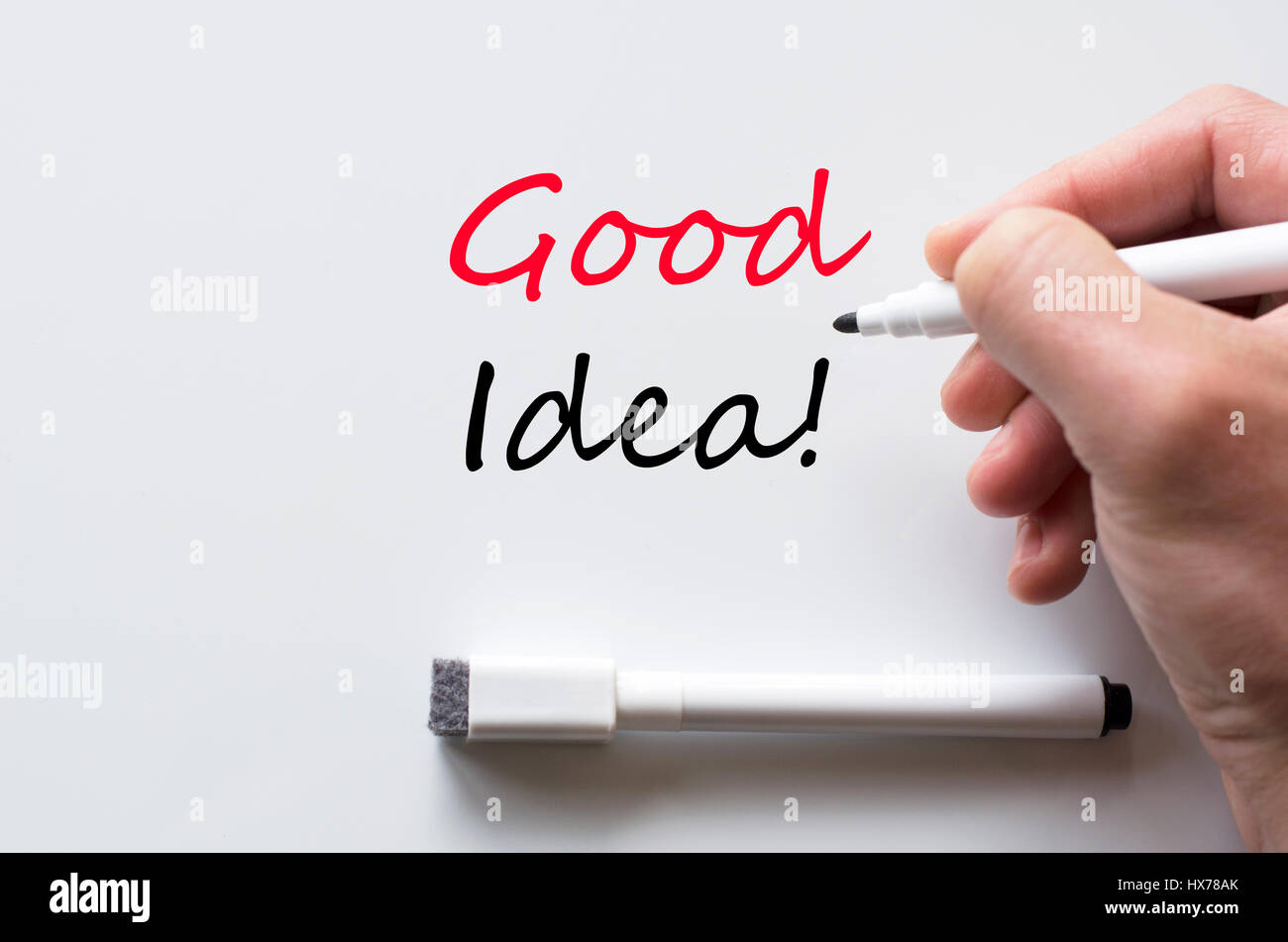 Human hand writing good idea on whiteboard Stock Photo - Alamy