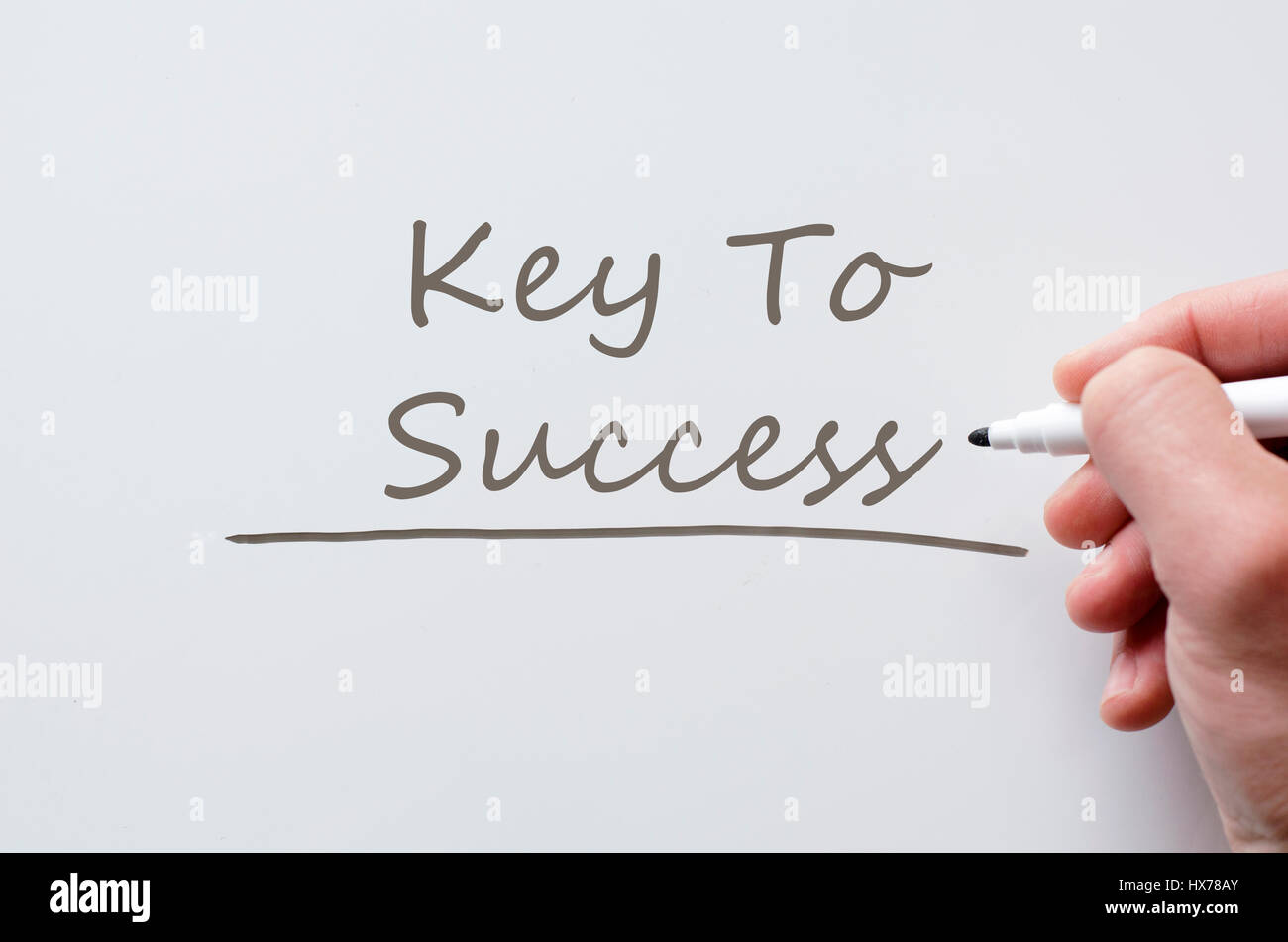 Human hand writing key to success on whiteboard Stock Photo - Alamy