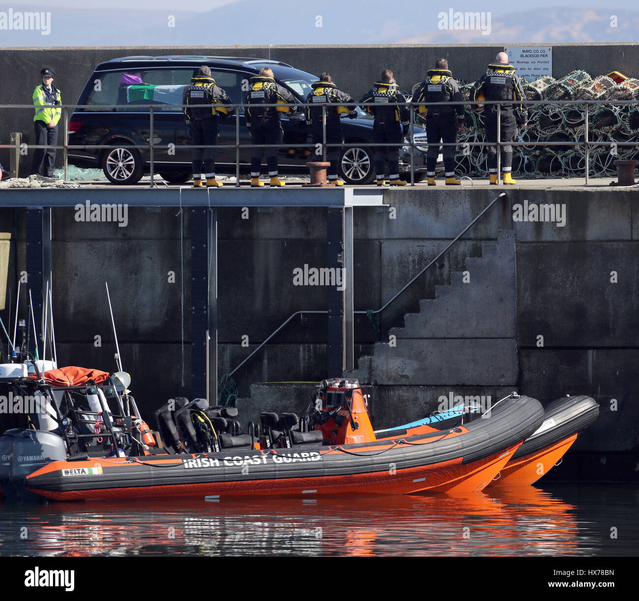 The body of Captain Mark Duffy is driven in a hearse along the seafront ...