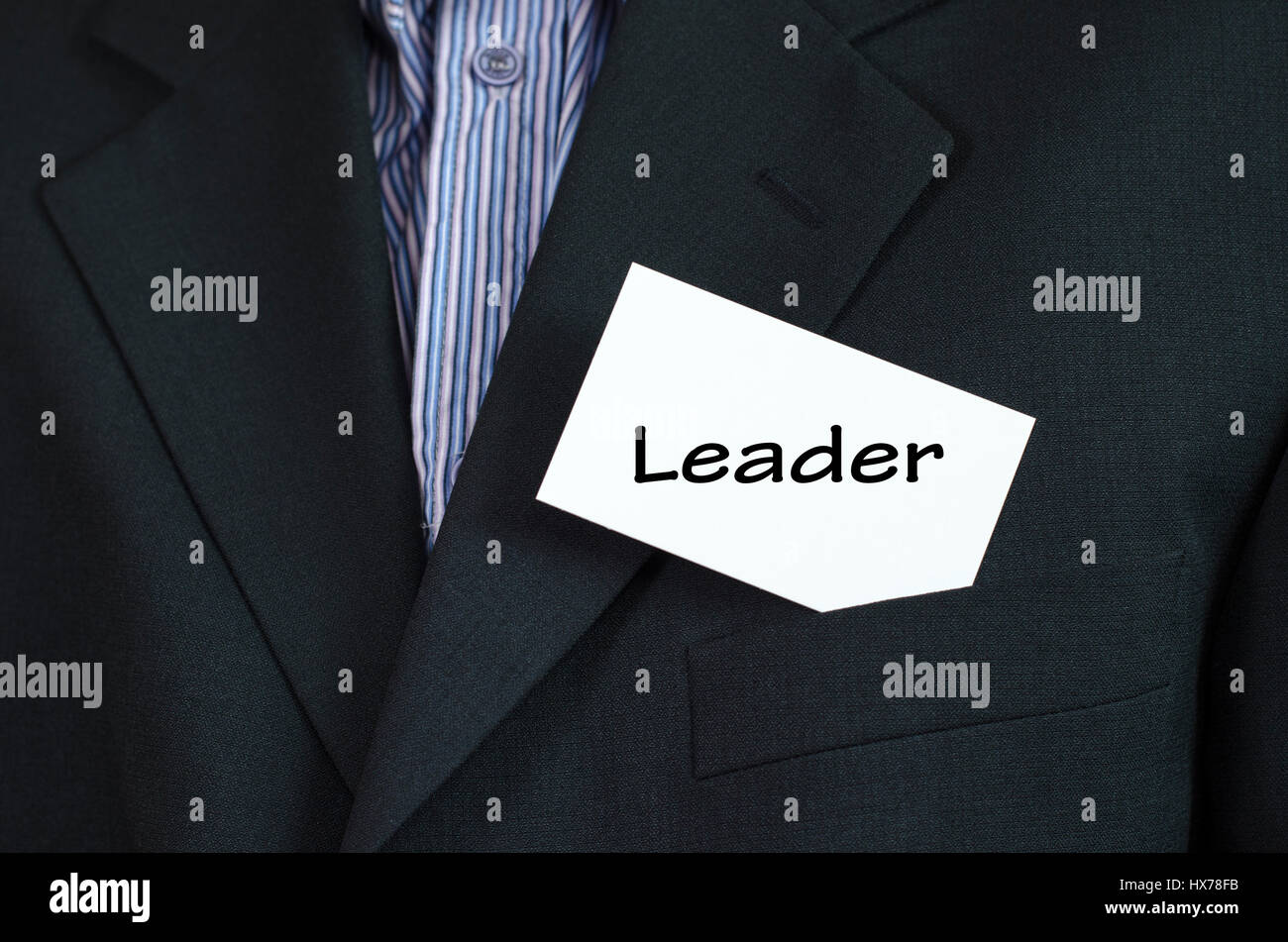 Leader text note concept over business man background Stock Photo - Alamy