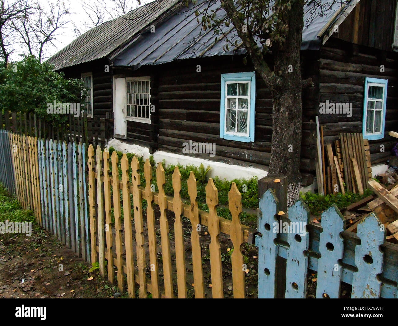 A traditional Russian house, made of wood or timbers and with ...