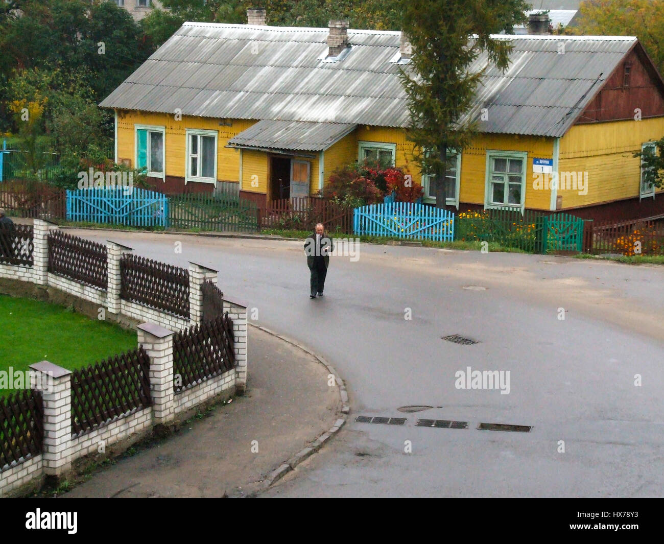 A traditional Russian house, made of wood or timbers and with ...