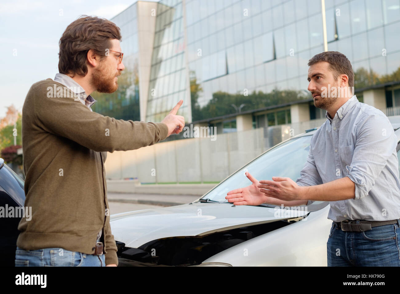 Two People Arguing From A Distance