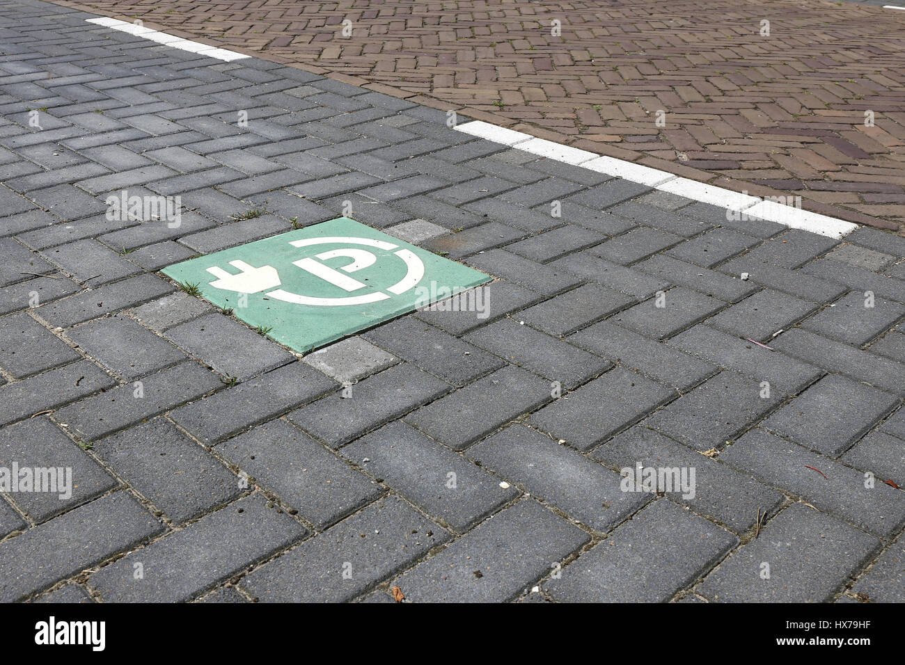 road marking in the Netherlands indicating a charging point for ...