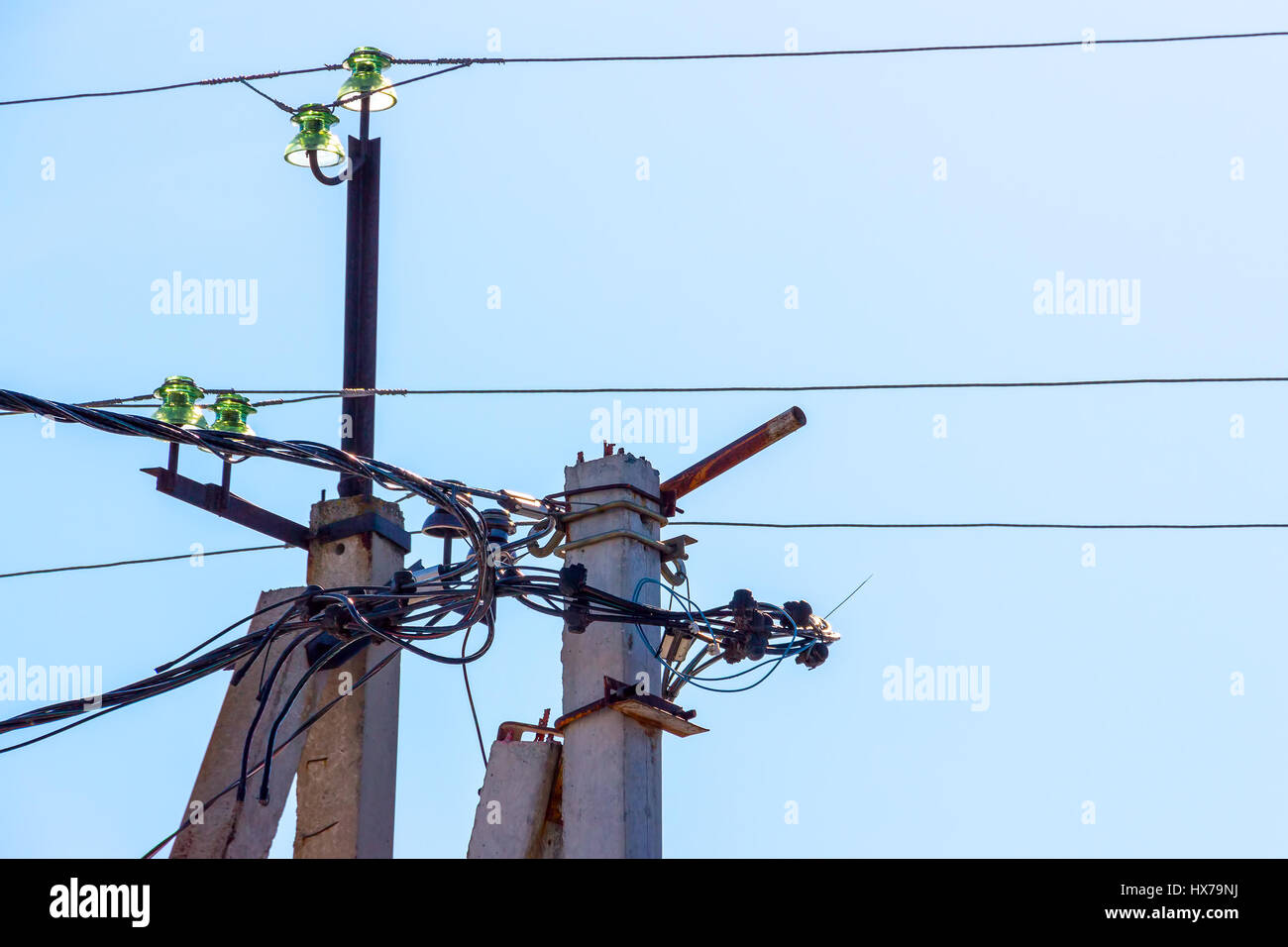 Electric poles, insulators and wire Stock Photo - Alamy
