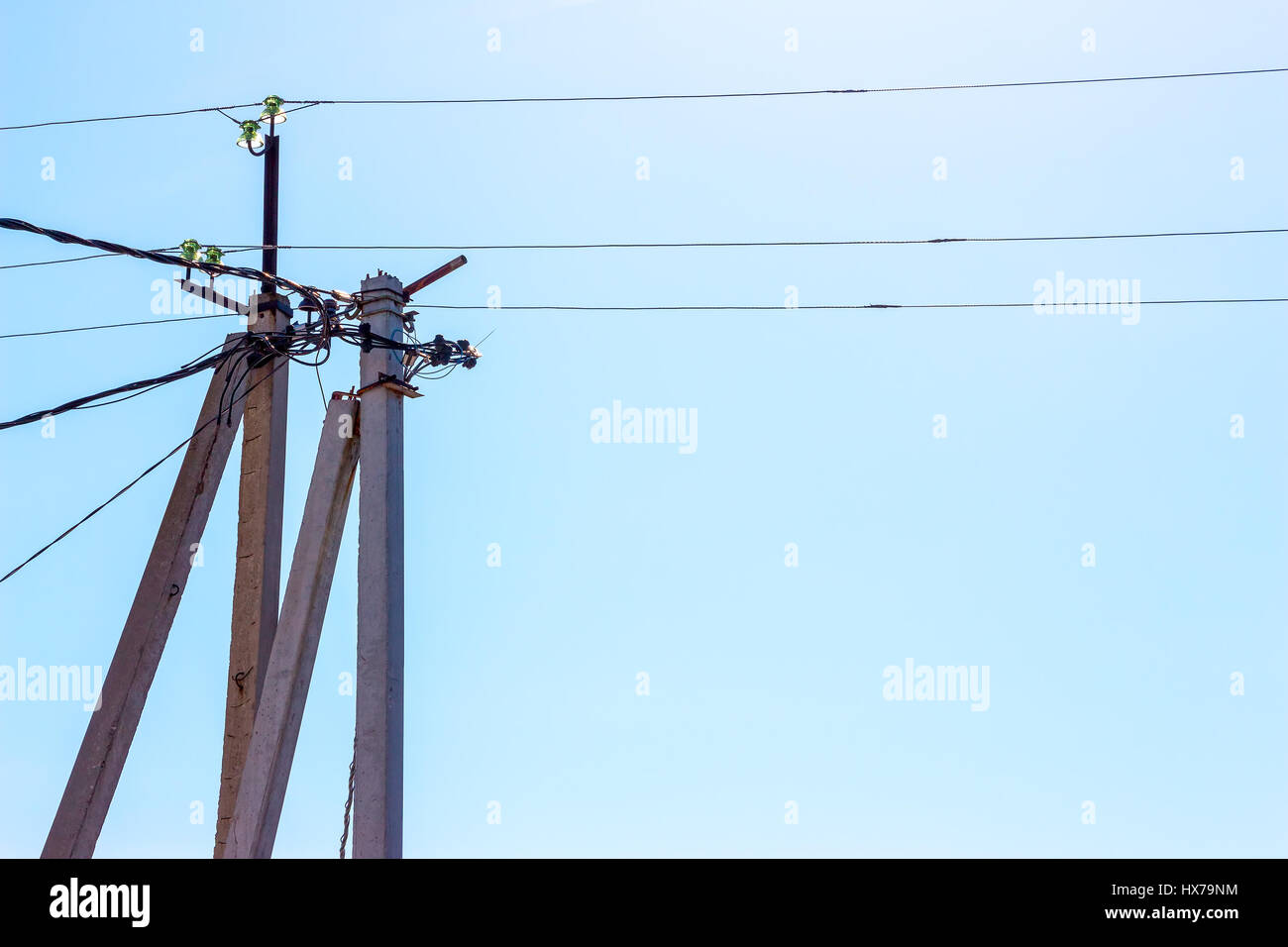 Electric poles, insulators and wire Stock Photo - Alamy