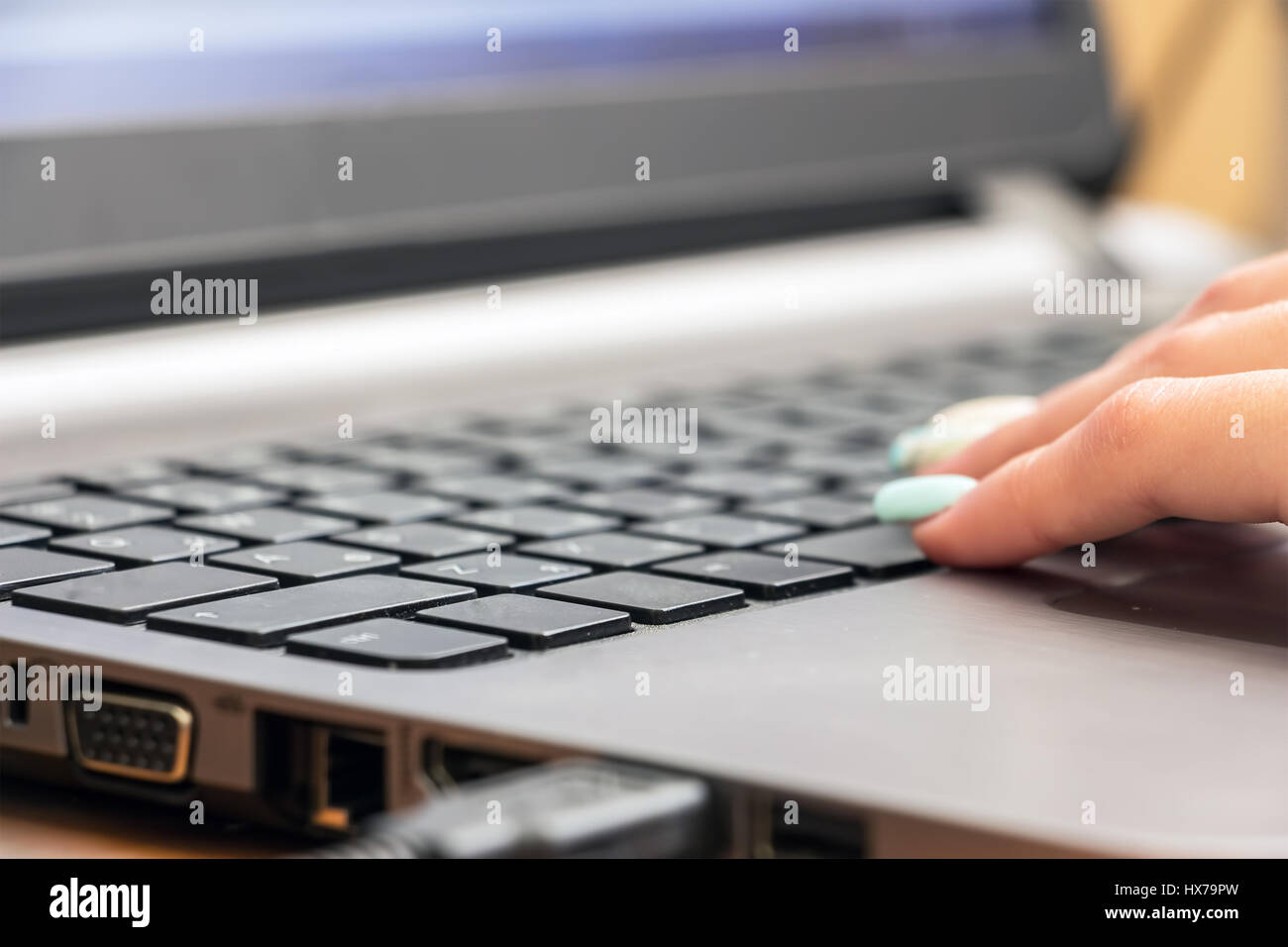 Woman's hand on keyboard Stock Photo - Alamy