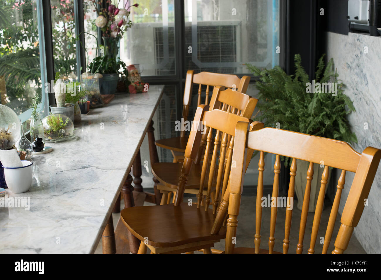 Chairs from inside a restaurant, bar section Stock Photo - Alamy