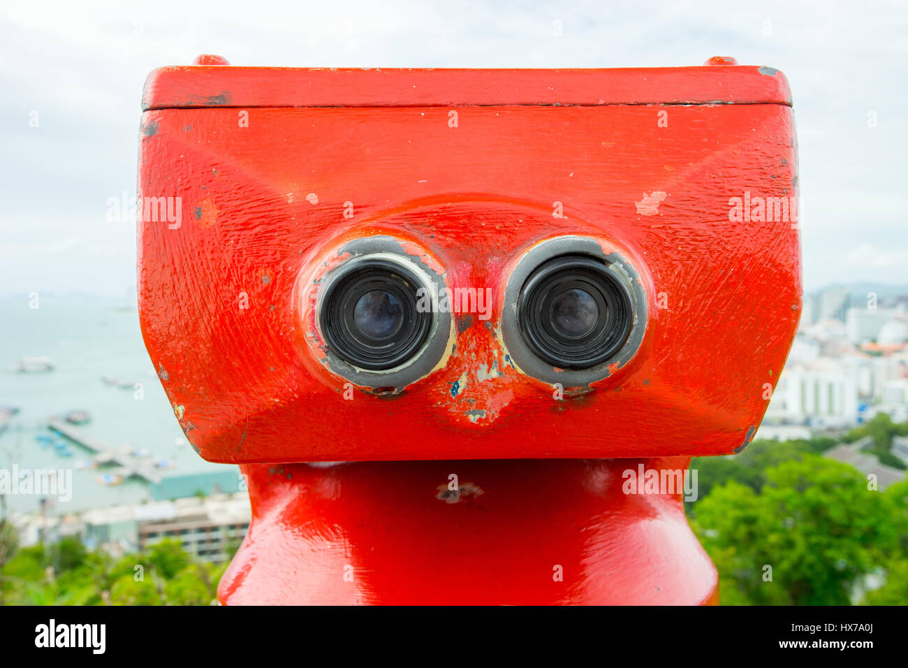 Coin operated vintage binocular overlooking Pattaya City Stock Photo ...
