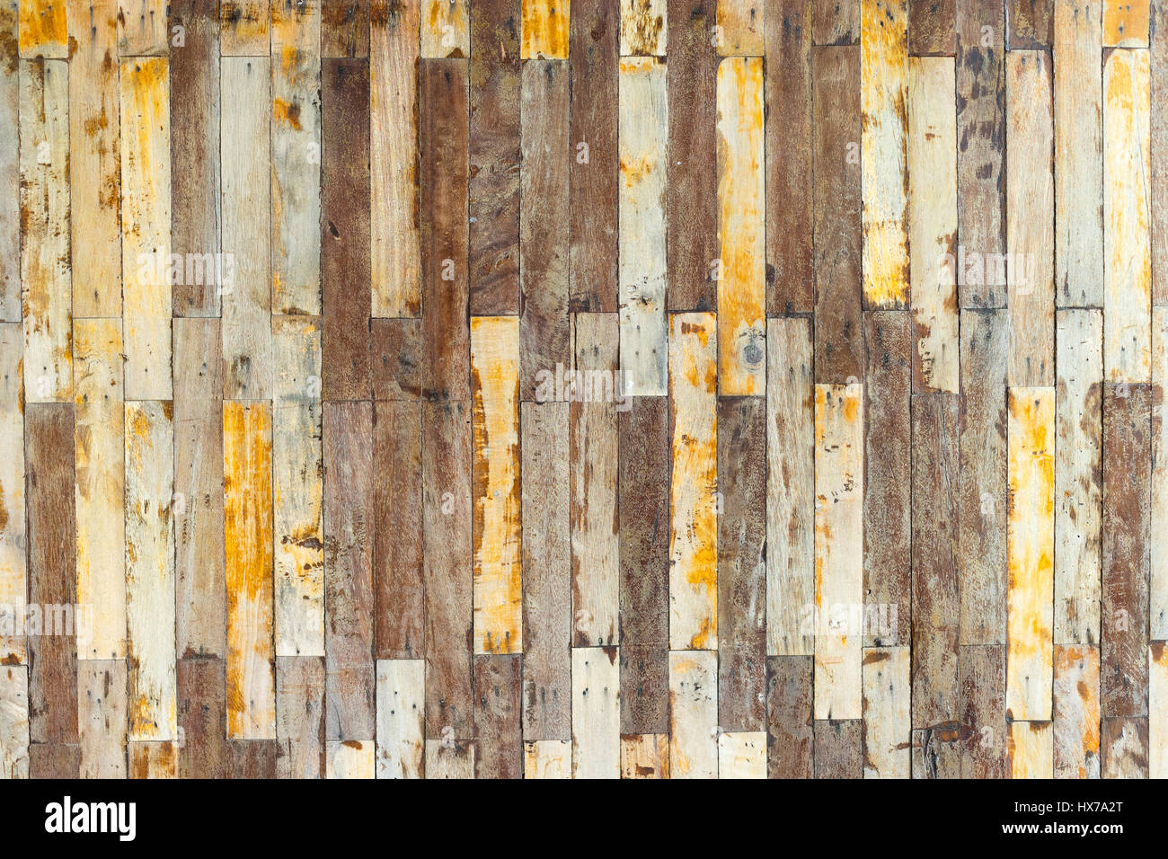 Texture of a yellow wooden palette wall Stock Photo - Alamy
