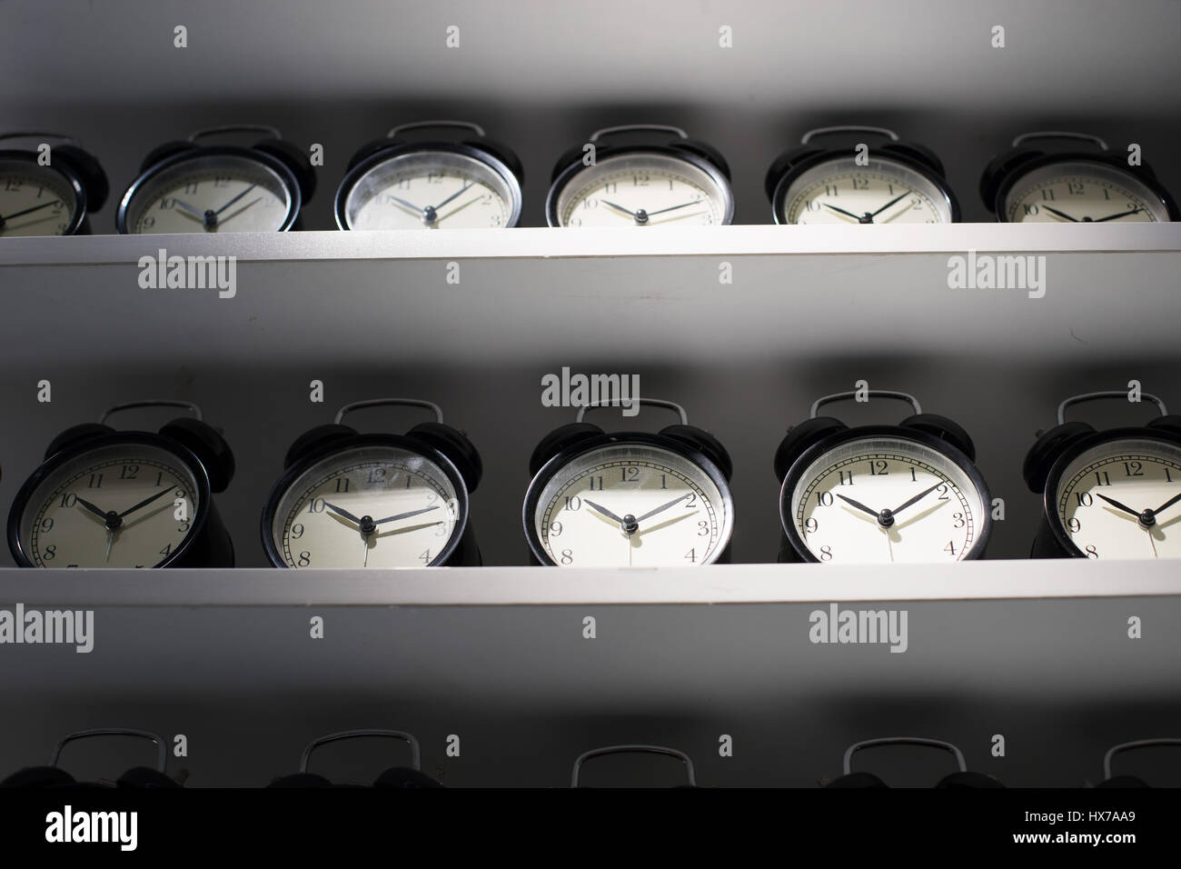 Close up on clock hanging on the wall Stock Photo - Alamy